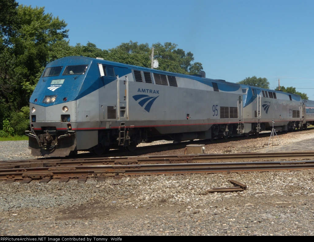 AMTK 95 and AMTK 831 lead Amtrak train 391 the southbound Saluki as it makes its station stop at ...
